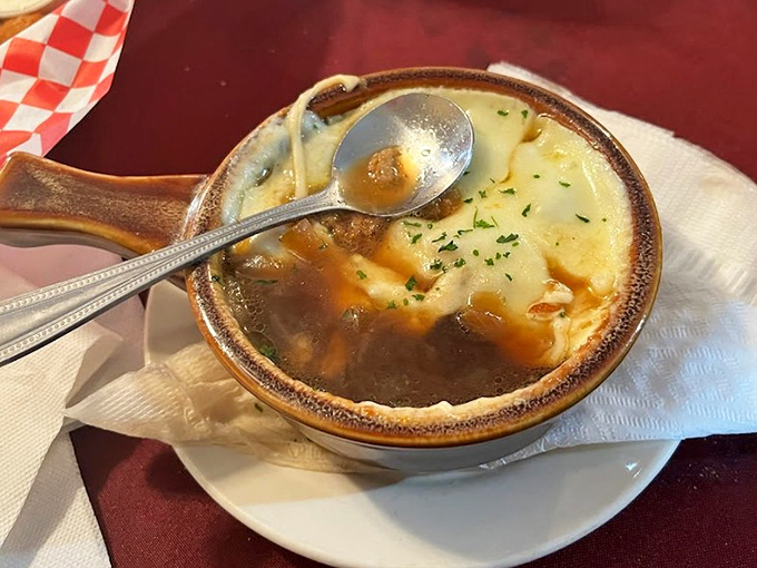 French onion soup that doesn't just warm your stomach but your soul&mdash;a cheese-topped sanctuary in a ceramic crock that deserves its own theme music.