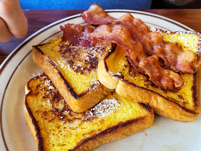 French toast that's achieved that magical golden-brown perfection. Add bacon and you've basically won morning. Game over, other meals.