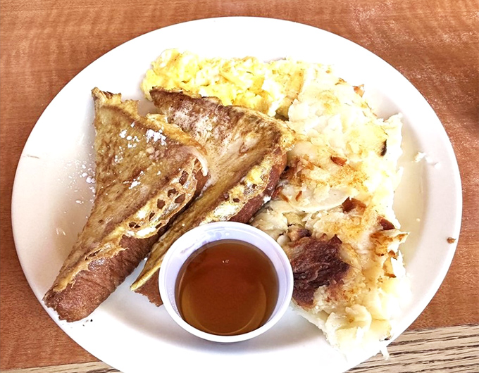 French toast that doesn't need fancy brioche or exotic toppings to impress&mdash;just perfect execution, maple syrup, and the promise of a nap afterward.