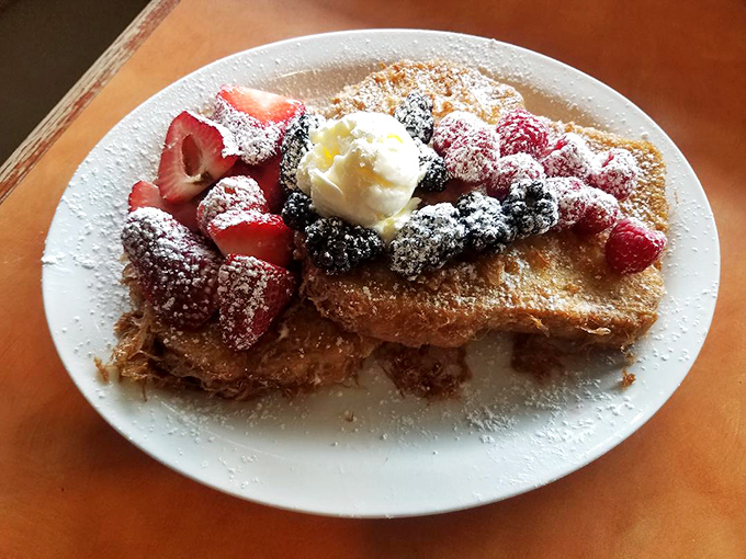 French toast that puts France to shame. Those berries aren't just garnish&mdash;they're jewels in a breakfast crown fit for royalty.