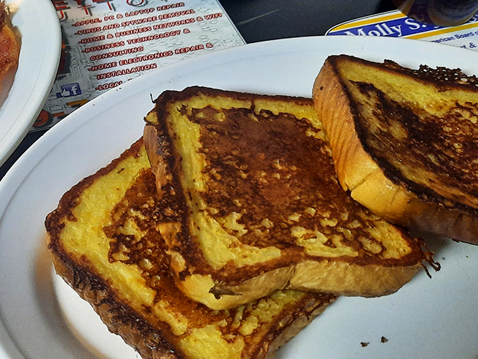 French toast that would make a Parisian jealous. Golden-brown perfection with that magical crisp-outside, fluffy-inside balance that eludes home cooks everywhere.