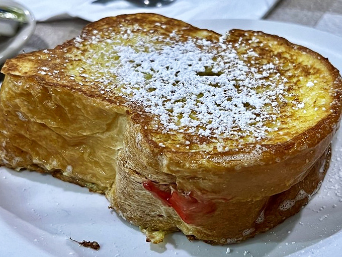 French toast so magnificent it deserves its own ZIP code—a golden-crusted masterpiece that makes ordinary breakfast feel like amateur hour.