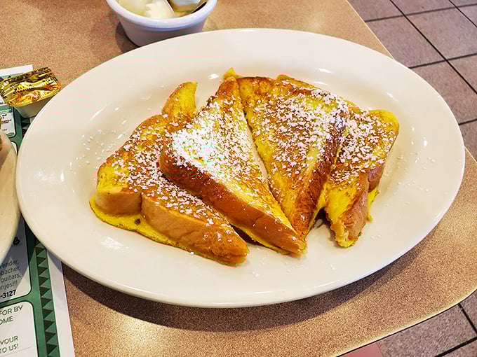 French toast that's dressed for success &ndash; golden, fluffy, and dusted with powdered sugar like the first snow of winter.