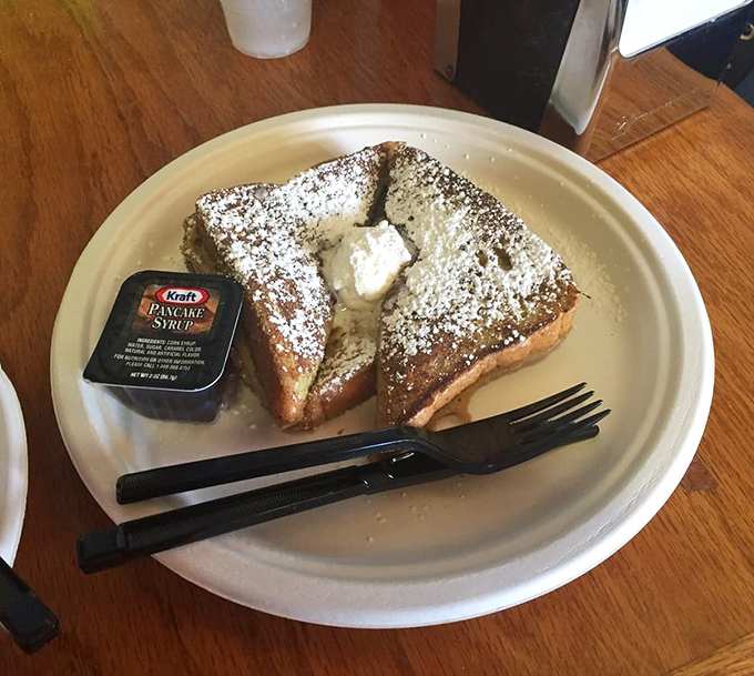 French toast that makes you question why anyone would ever eat cereal again. Dusted with powdered sugar and served with maple syrup&mdash;breakfast royalty.