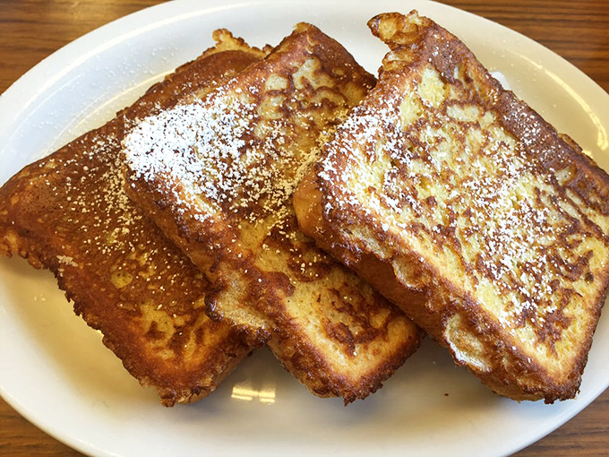 French toast that would make a Parisian jealous. Three slices of golden perfection dusted with powdered sugar&mdash;no passport required.