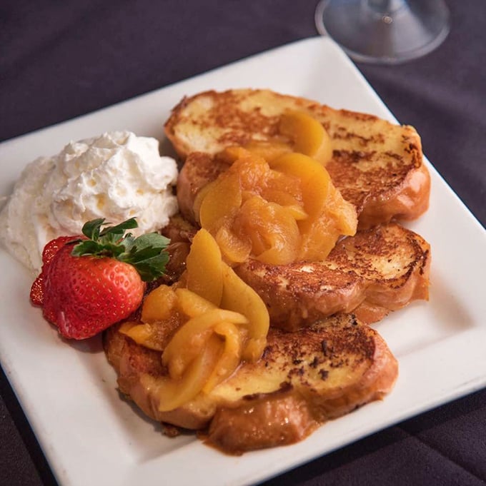 French toast that makes breakfast feel like dessert, with peach compote that tastes like summer decided to pay a surprise visit.