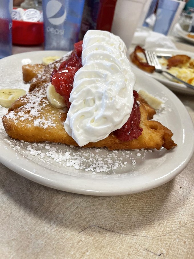 French toast that puts the "Oh!" in "Oh my goodness!" Strawberry topping, whipped cream, and a dusting of powdered sugar create breakfast that's practically dessert.