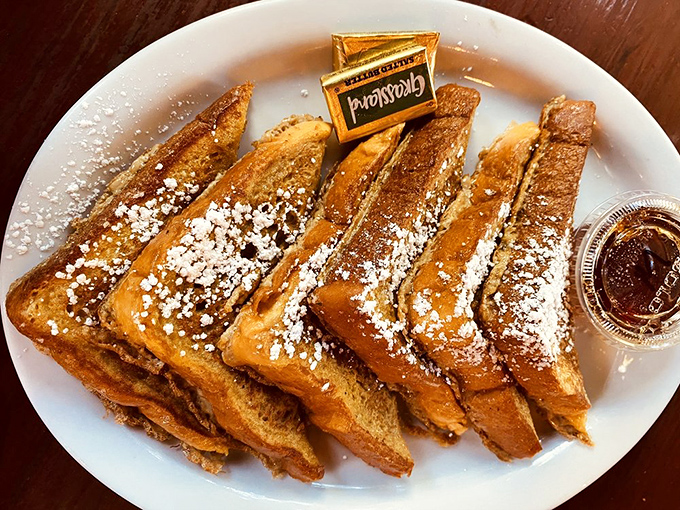 French toast that makes you understand why the French are so smug about their cuisine. Dusted with powdered sugar like fresh mountain snow.