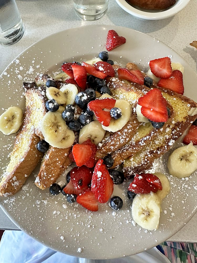 French toast that's dressed for success with fresh berries and bananas. Breakfast or dessert? The line deliciously blurs.