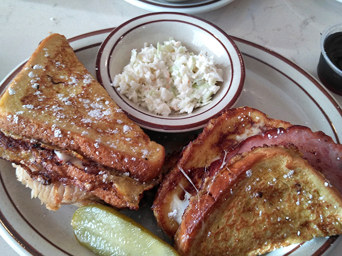 Golden-brown French toast that's achieved that mythical balance &ndash; crispy edges, custardy center, and enough powdered sugar to leave evidence on your shirt.