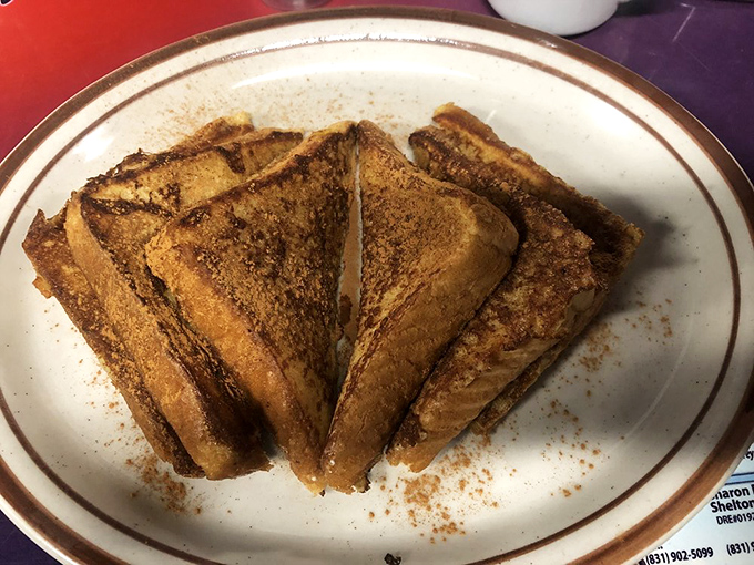 French toast that makes ordinary bread feel inadequate. Perfectly caramelized with a dusting of cinnamon that whispers, "Good morning, gorgeous."