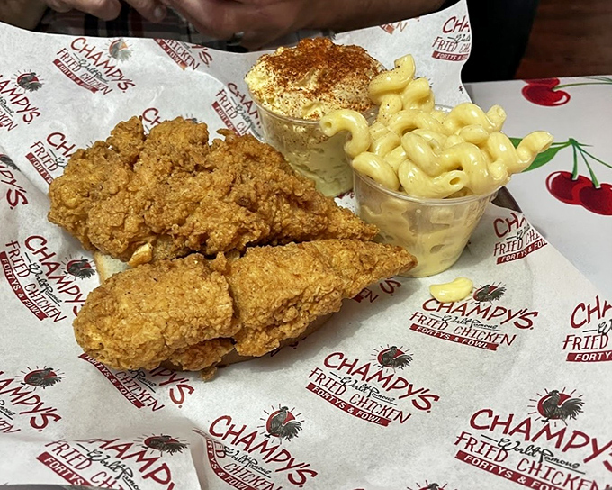 Fried chicken so perfectly golden it belongs in Fort Knox. The kind of crunch that makes strangers at nearby tables look over with envy.