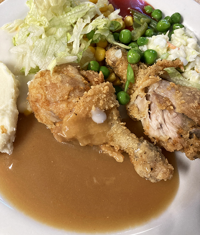 Fried chicken so perfectly golden, it makes you wonder if the Colonel himself would weep with envy and respect.