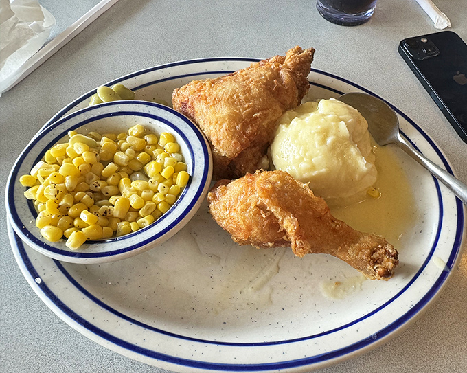 Fried chicken that would make Colonel Sanders question his life choices, paired with mashed potatoes that could solve world peace.