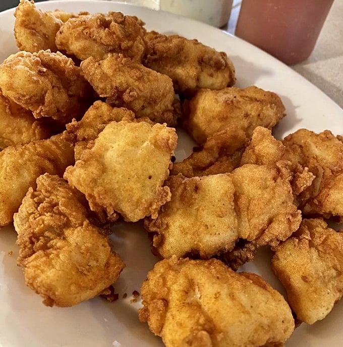 Golden-brown nuggets of perfectly fried cod that could make even a Bostonian homesick. With a crisp exterior and tender, flaky inside, it’s seafood perfection.