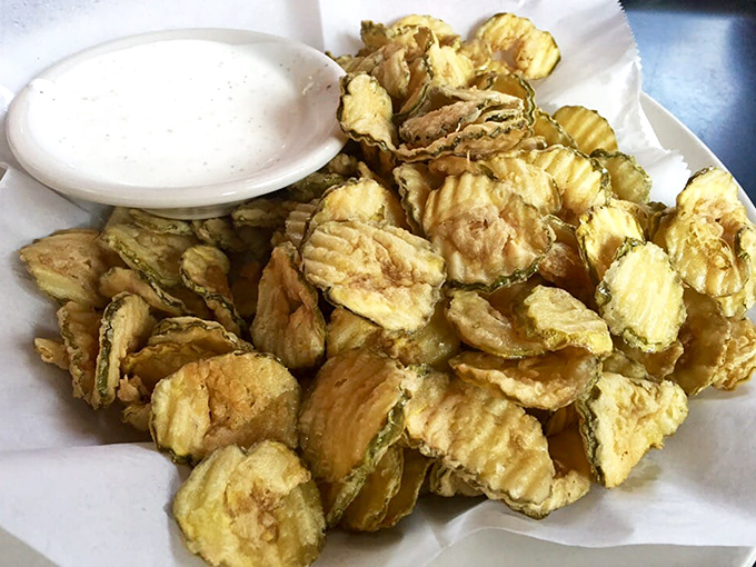These aren't your garden-variety pickles—they're crispy, golden-fried dill chips that deliver a perfect tangy crunch with every bite.