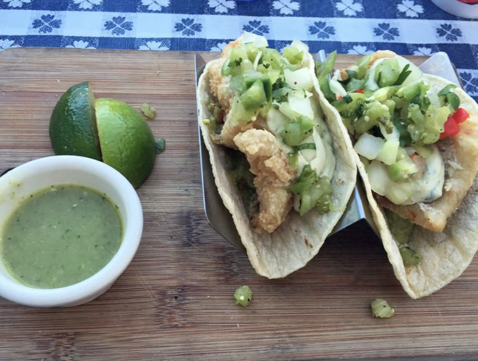 Fried fish tacos with that perfect green sauce - California meets comfort in three beautiful, messy bites.