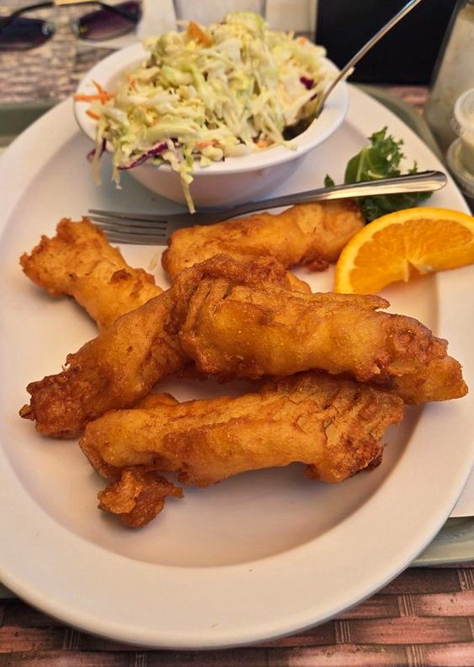 These golden fish fillets aren't just fried – they're transformed into crunchy-on-the-outside, tender-on-the-inside works of art.