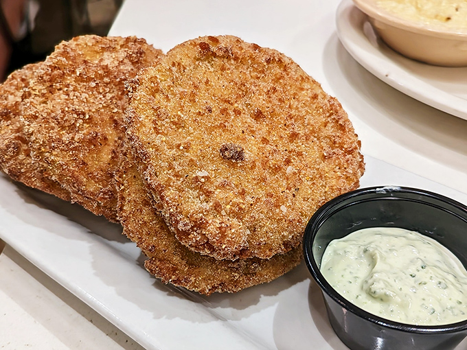 Fried green tomatoes with a Southern drawl&mdash;crispy, tangy discs that make you wonder why we ever bother eating them red.
