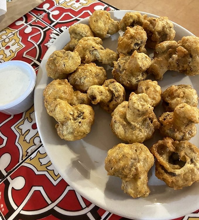 These golden-fried mushrooms aren't just appetizers; they're little umami bombs waiting to explode with flavor. Dipping sauce not optional!