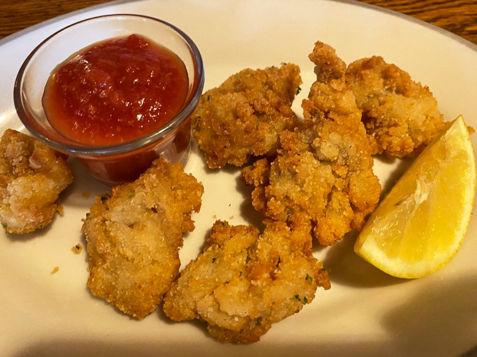 Fried oysters that crackle like vinyl records but taste like the ocean. That little squeeze of lemon is all the accessorizing they need.