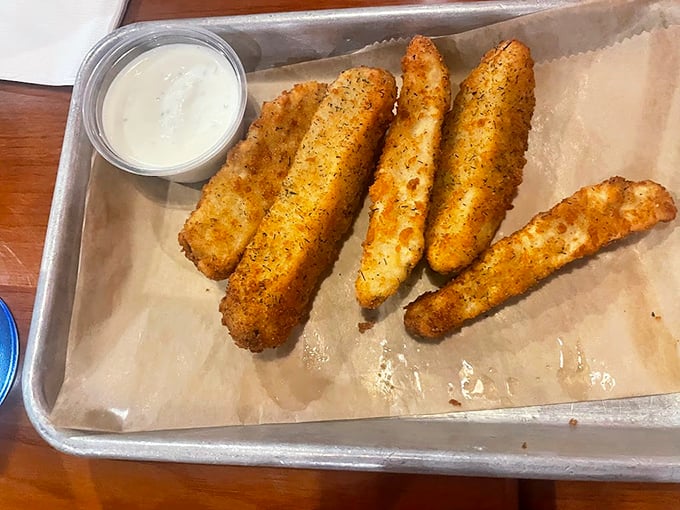 Fried pickles – the unexpected hero of the appetizer world. Crispy, tangy, and utterly addictive with that cool dipping sauce.