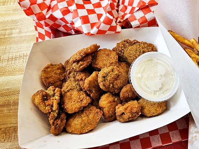 Golden fried pickles that'll make you question why every restaurant doesn't serve these crispy little miracles.