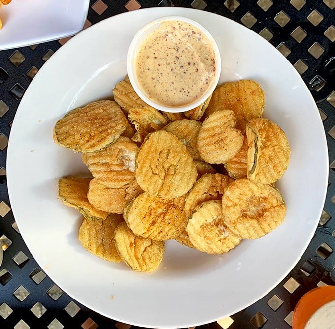Golden-fried pickle chips with a side of remoulade&mdash;the South's answer to potato chips and dip, only infinitely more interesting.