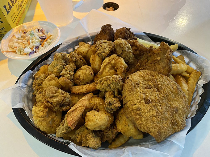 The fried seafood platter &ndash; where indecision meets perfection. Golden-battered treasures from the Gulf that would make Neptune himself order seconds.