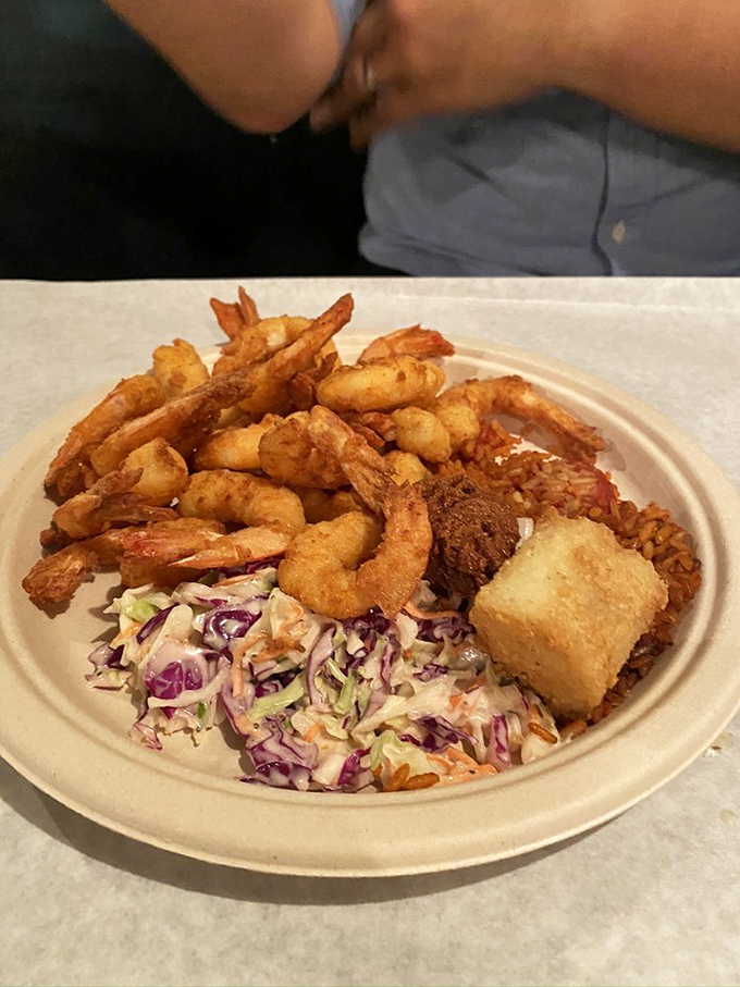 Golden-fried shrimp that snap between your teeth, nestled alongside hominy squares and colorful slaw &ndash; this is South Carolina on a plate.
