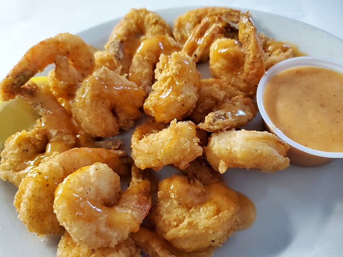 These fried shrimp aren't just golden &ndash; they're the Olympic gold medalists of the seafood world, with a dipping sauce that deserves its own medal ceremony.
