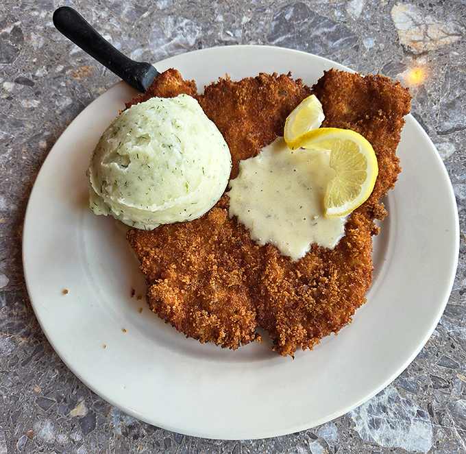 Golden-crusted perfection meets generous portions in this classic preparation that never goes out of culinary style.