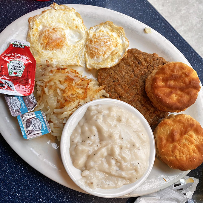 Southern hospitality on a plate &ndash; crispy country-fried steak with creamy gravy and golden hash browns that would make any grandmother nod in approval.