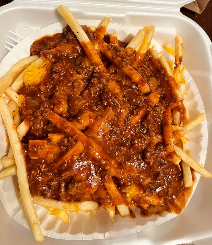 Chili cheese fries that don't mess around&mdash;crispy potatoes swimming in a sea of beefy, spicy goodness that demands to be devoured.