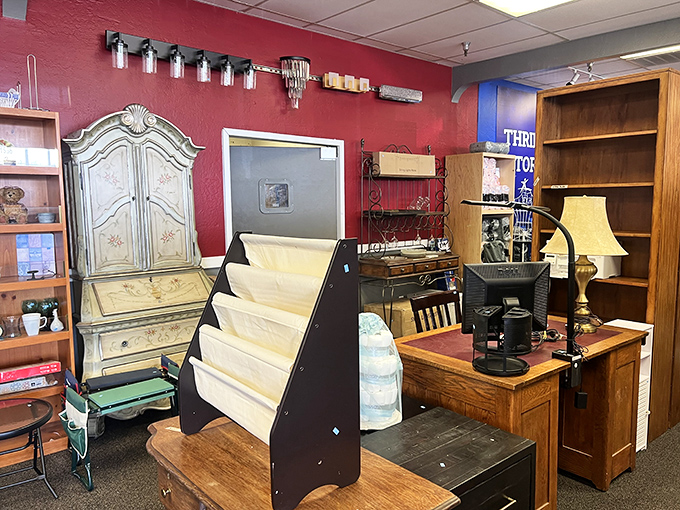 Vintage meets practical in this furniture display. That ornate secretary desk has probably seen more history than most history books on the shelves.