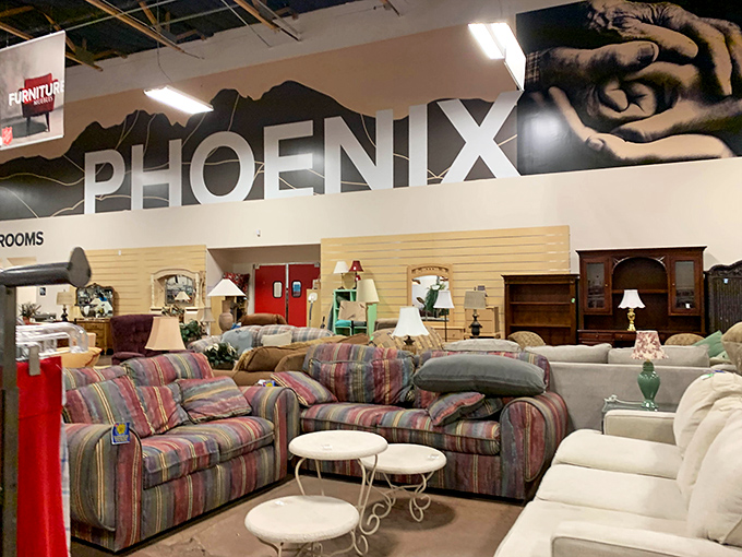 The furniture section showcases enough seating options to host the world's most eclectic dinner party under that bold "PHOENIX" sign.