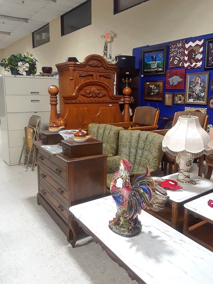 That ornate wooden headboard has stories to tell. Between the rooster figurine and vintage dresser, someone's grandmother would feel right at home here.