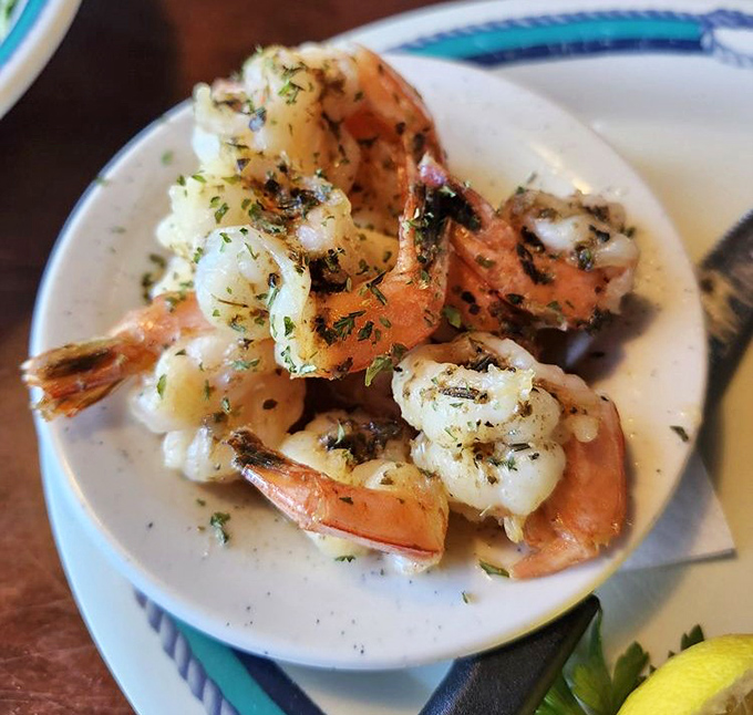Garlic shrimp that's not playing around &ndash; plump, perfectly cooked, and unapologetically aromatic. Your breath might suffer, but your taste buds will throw a parade.