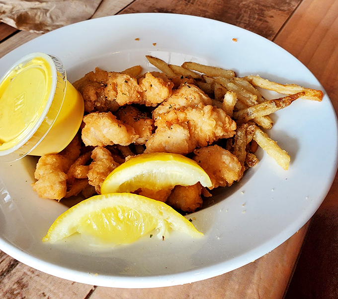 These golden nuggets of fried goodness aren't just a meal&mdash;they're a Florida initiation ritual served with a side of lemon.