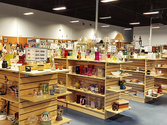 Shelves of glassware and knickknacks tell stories of decades past. That vase might have held flowers at someone's 1970s wedding!
