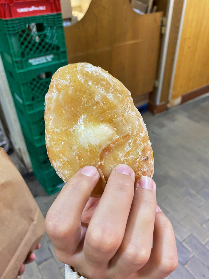 The glazed cream donut &ndash; proof that sometimes the simplest pleasures are the most profound. That glisten isn't just sugar; it's joy.