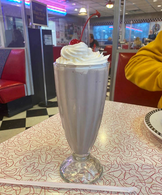 That's not just a milkshake&mdash;it's a tower of creamy nostalgia topped with whipped cream and a cherry that's begging to be Instagrammed before it's devoured.
