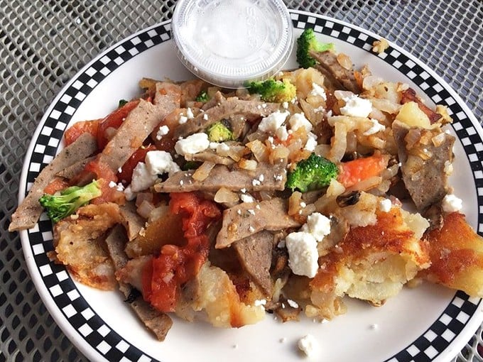 This isn't just hash, it's a colorful conversation of flavors where potatoes, vegetables, and feta cheese all get equal talking time.