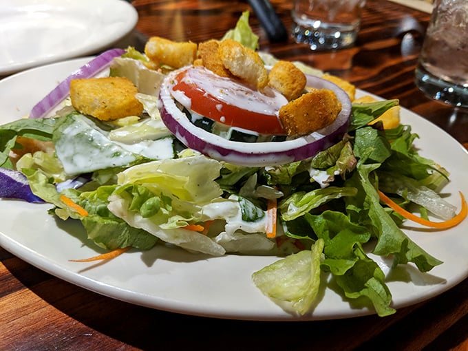 A salad that actually deserves respect&mdash;crisp, colorful, and crowned with those perfect red onion rings that make you forget you're eating vegetables.