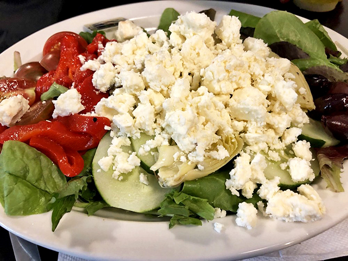 A Greek salad that makes you wonder if Columbus secretly has a Mediterranean coastline&mdash;feta crumbles like delicious snowdrifts over fresh vegetables.