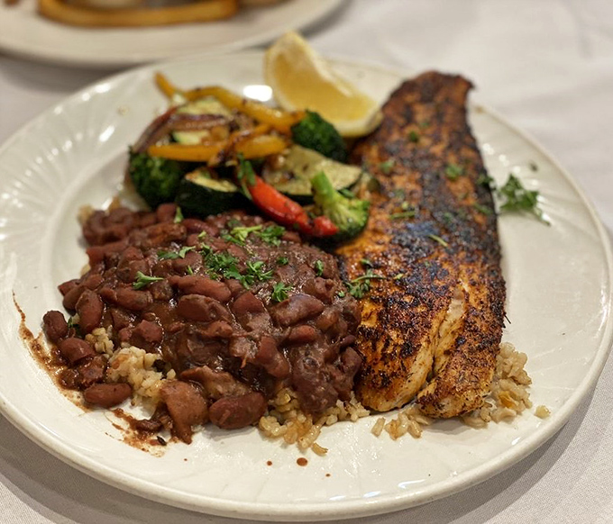 Blackened fish perfection atop rice with red beans and saut&eacute;ed vegetables&mdash;proof that healthy eating and flavor aren't mutually exclusive concepts.