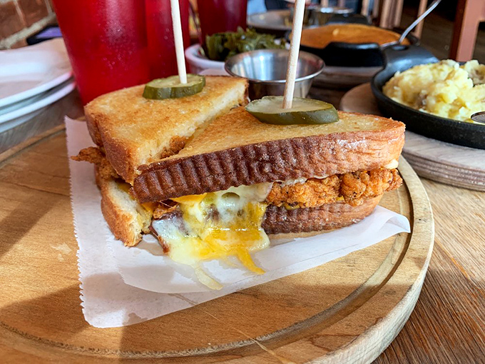Behold the grilled cheese that makes all other grilled cheeses question their life choices. That melty cascade is pure sandwich drama.