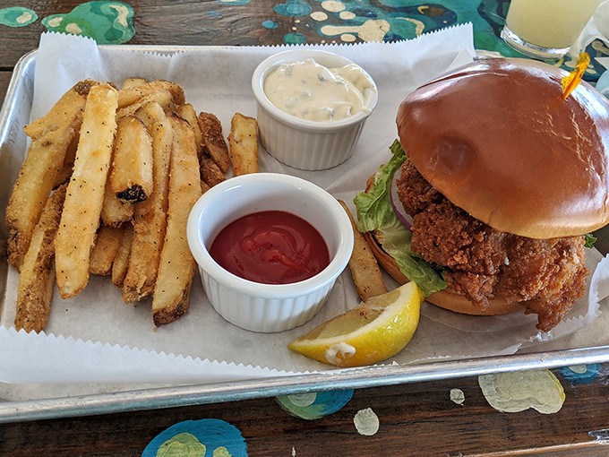 A grouper sandwich that requires a game plan before the first bite. Those fries aren't sides &ndash; they're co-stars in this Florida production.
