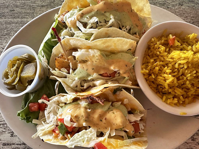 These fish tacos don't need a passport to transport you to coastal paradise. The rice pilaf makes a perfect supporting actor.
