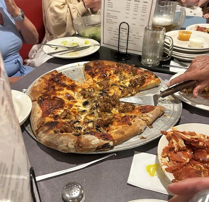 The half-and-half approach: for when you can't decide between two perfect options, or when you're dining with someone who's clearly wrong about toppings.